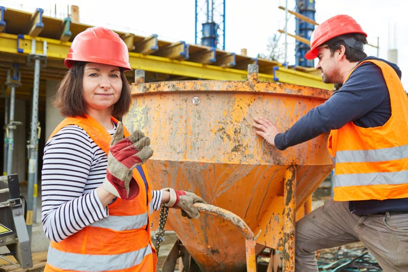 Construction Workers Team Working On Cement Mixer Stock Photo - Image ...