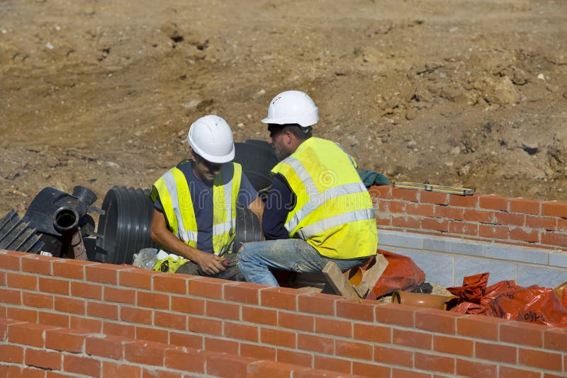 Construction workers editorial stock image. Image of level - 86322194