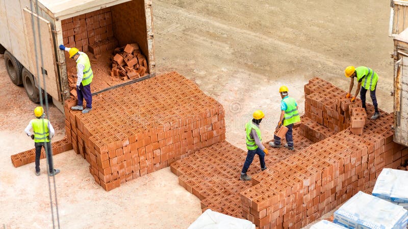 Construction Workers Unloading Bricks Editorial Stock Photo - Image of ...