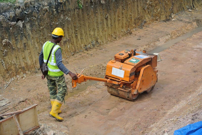 Construction Workers Using Baby Roller Compactor Editorial Image ...