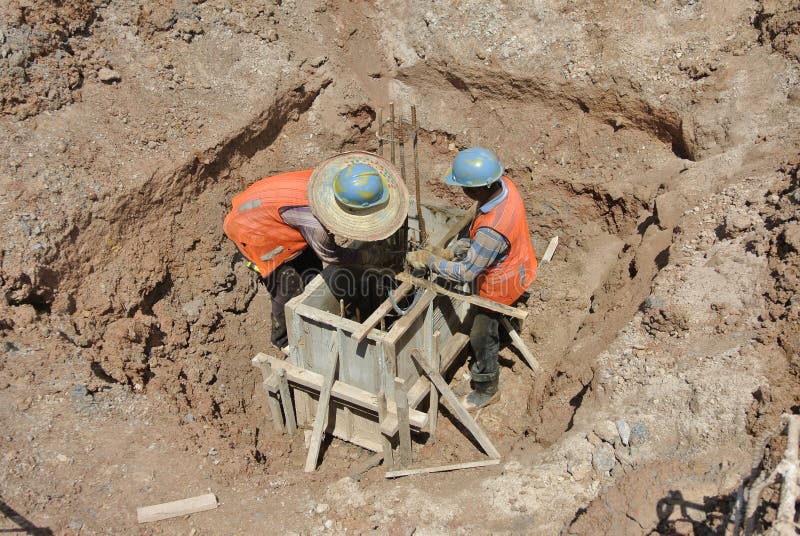 Construction Workers Using Grinder To Cut Steel Stock Photo - Image of ...