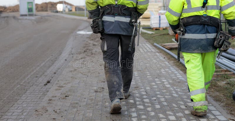Construction Workers Walking on Site Stock Photo - Image of manual ...