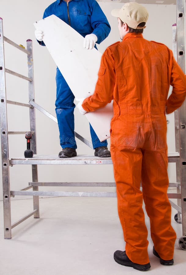 Two Workers Cleaning Floor in Industrial Building Stock Photo - Image ...