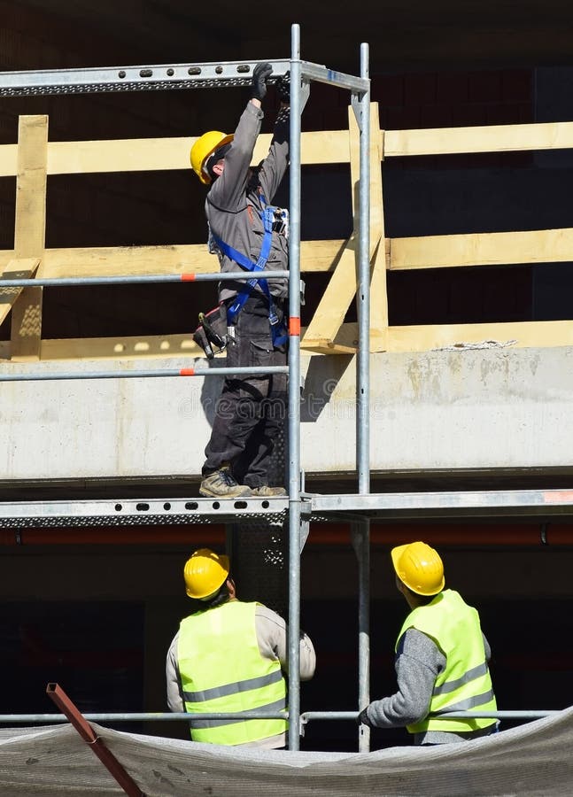 Construction Workers at Work Stock Photo - Image of adult, fence: 61005762