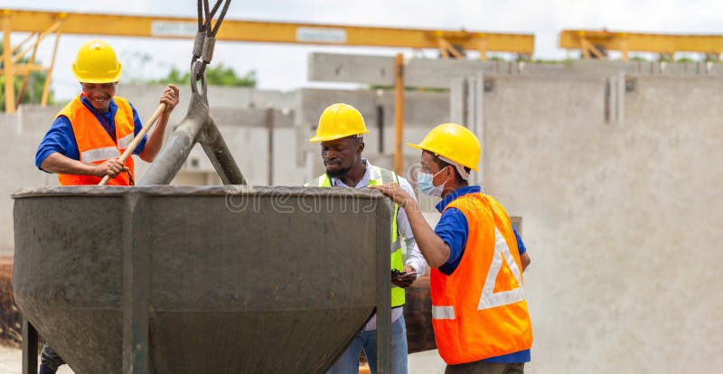 Construction Workers at Work, Foreman and Worker Team Discussing at ...