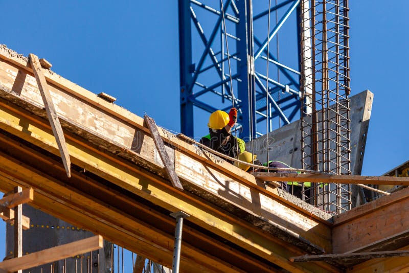 Construction Workers Work on High Rise Buildings Stock Image - Image of ...