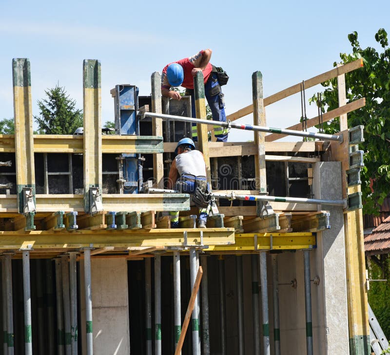 Construction Workers at Work Editorial Photography - Image of exterior ...