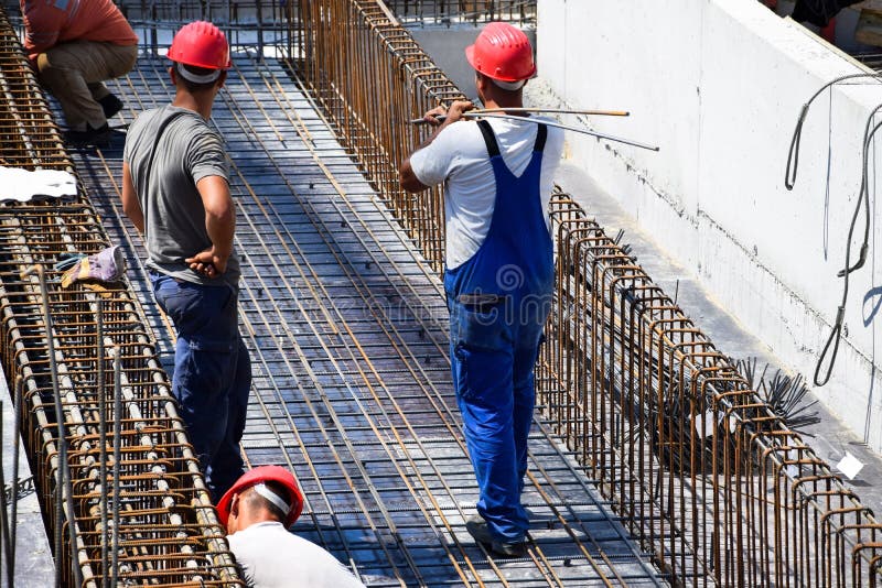 Construction Workers at Work Stock Photo - Image of iron, manual: 61009202