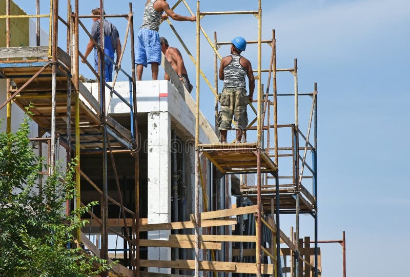 Construction Workers at Work Editorial Photography - Image of class ...