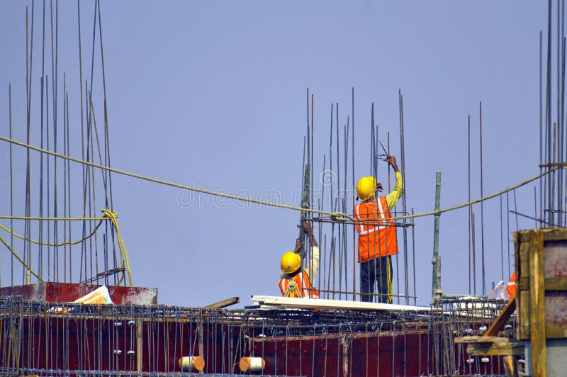 Construction Workers Working on a Building Column Editorial Image ...