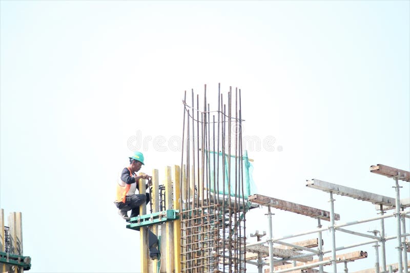 Construction Workers Working on a Building Editorial Stock Photo ...