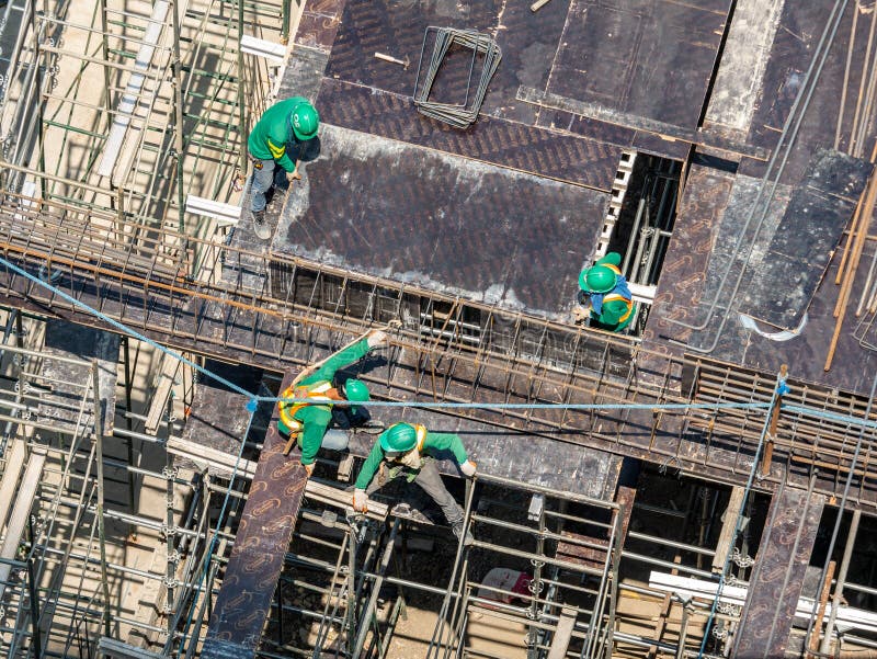 Construction Workers Working in the Building Stock Photo - Image of ...