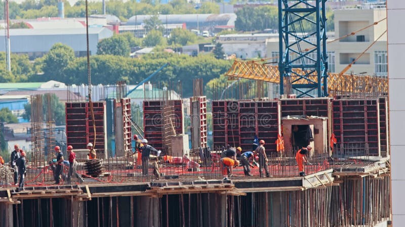 Construction Workers Building New Skyscraper in Urban Area Stock Video ...