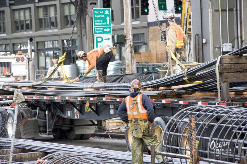 Construction Workers Working Hard Editorial Photo - Image of wheels ...
