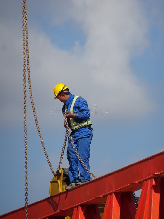 Construction Workers Working at Height at the Construction Site ...