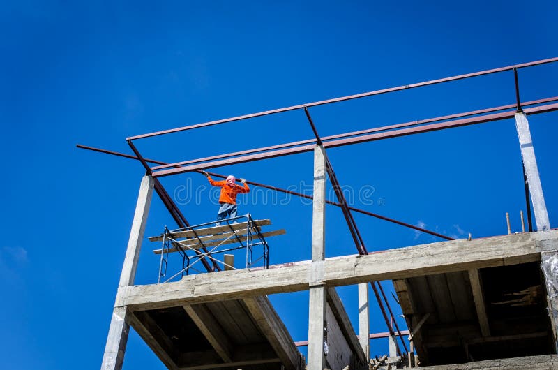 Construction Workers Working on High. Editorial Photography - Image of ...