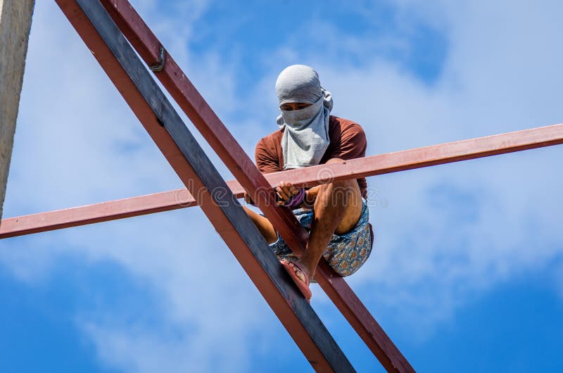 Construction Workers Working on High. Editorial Stock Image - Image of ...