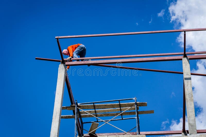 Construction Workers Working on High. Stock Image - Image of engineer ...