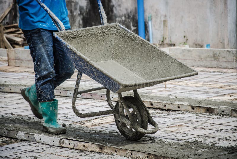 Construction Workers are Working on the Job Site with a Cement Cart ...