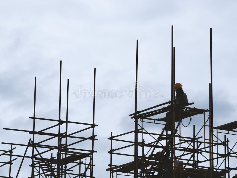 Man Working on the Working at Height on Construction Stock Photo ...