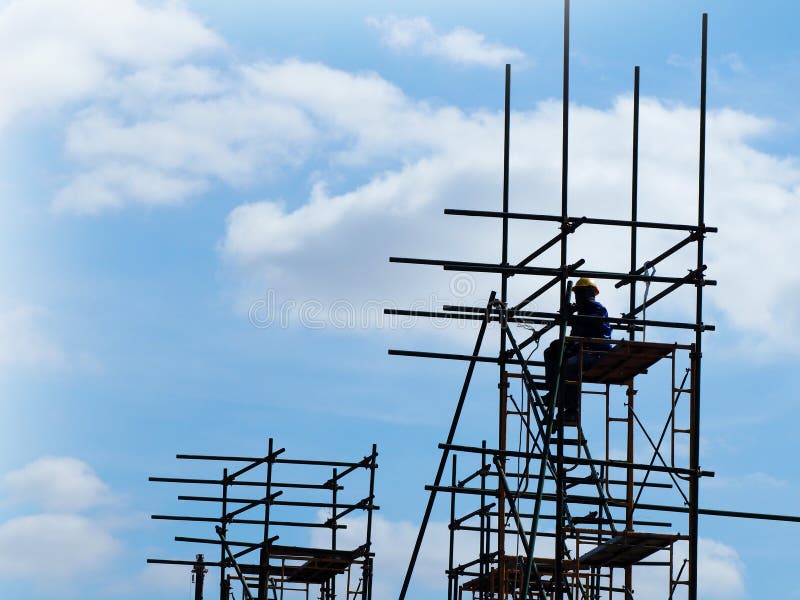 Man Working on the Working at Height on Construction Stock Photo ...