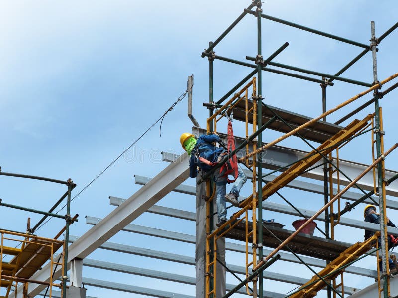 Man Working on the Working at Height on Construction Stock Photo ...