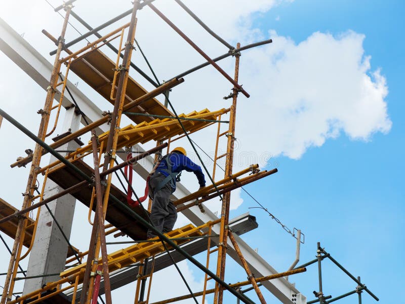 Man Working on the Working at Height on Construction Stock Photo ...