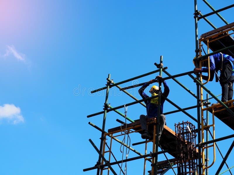 Man Working on the Working at Height on Construction Stock Photo ...