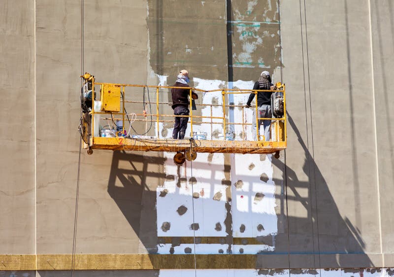 Construction Workers Working on Side of House Editorial Stock Image ...