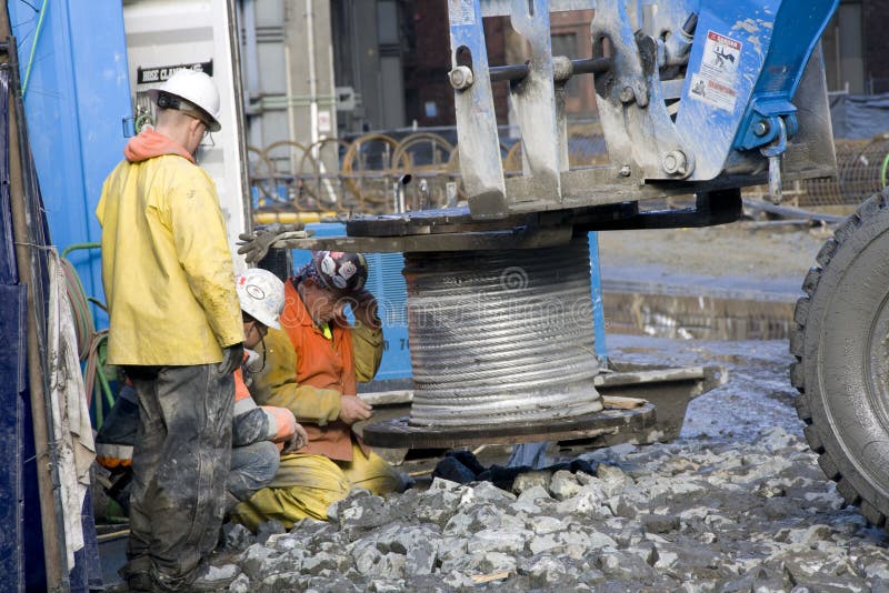 Construction Workers Working Together Editorial Photography - Image of ...