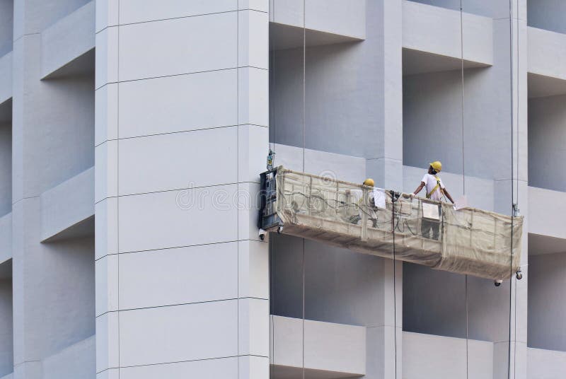Construction Workirs Hanging from Building Stock Image - Image of ...