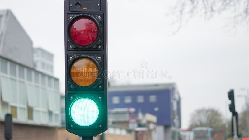 A Construction Zone with Active Roadwork and Traffic Lights Regulating ...