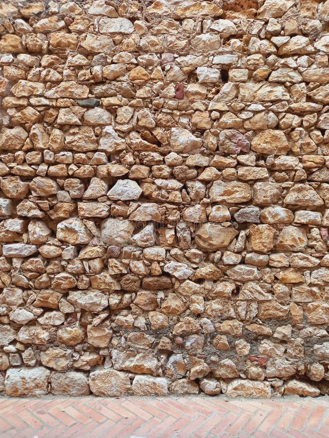Old Wall of Stone and Mud. Rustic Stone Facade. Constructions and ...