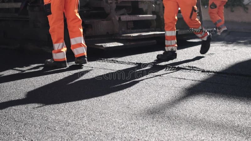 Constructions Workers Working on Road Construction Slow Motion. Stock ...