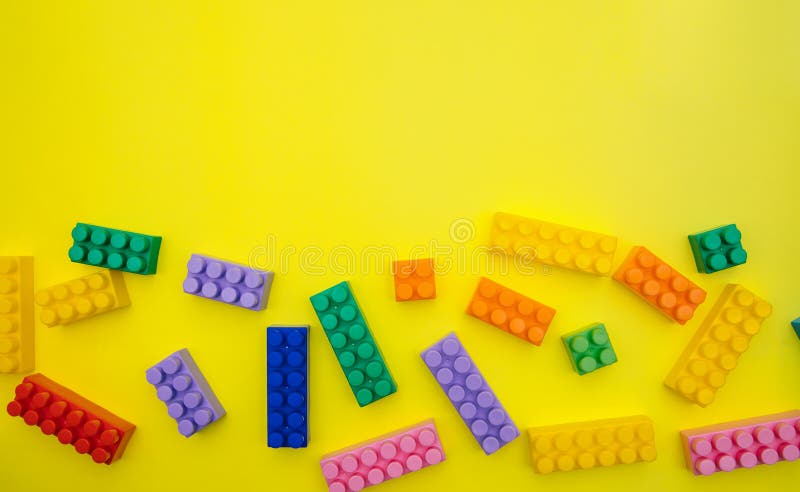 Constructor Details are Scattered on a Yellow Background. Multi-colored ...