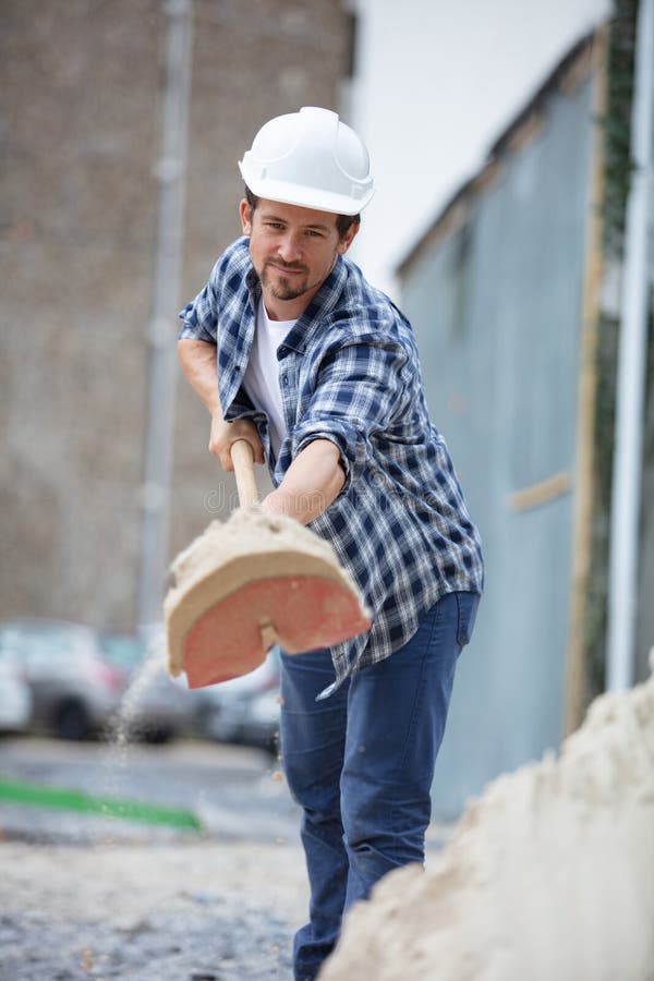Constructor Holding Work Shovel at Site Stock Photo - Image of ...