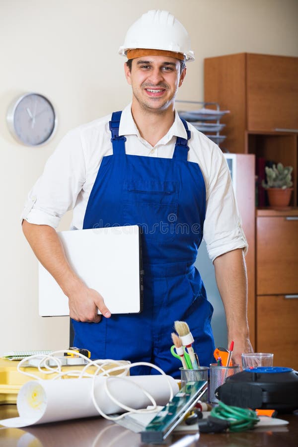 Constructor with Tools and Blueprints in Office Stock Image - Image of ...