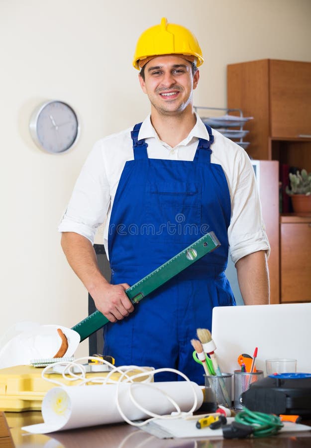 Constructor with Tools and Blueprints in Office Stock Image - Image of ...
