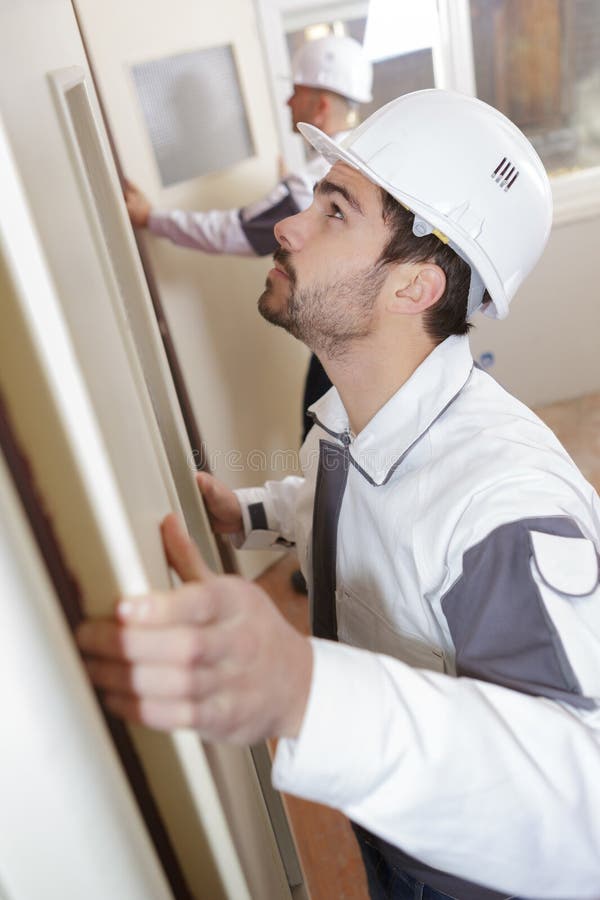 Constructors Checking Door Panel Stock Image - Image of household ...