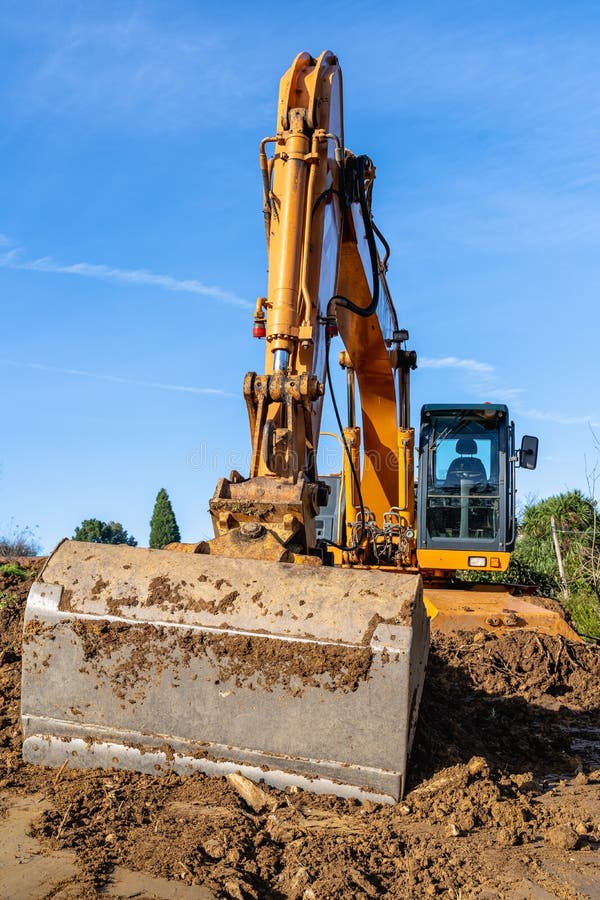 Constuction Industry Heavy Equipment Yellow Excavator at Construction ...