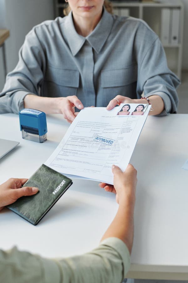 Consular Officer Giving Documents Back Stock Photo - Image of consulate ...