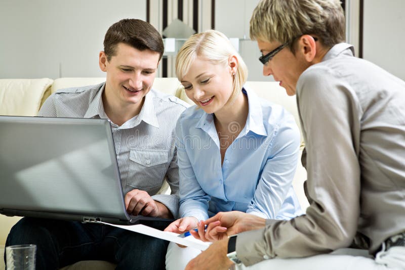 Young Attractive Couple at Consultation with Female Consultant. Stock ...