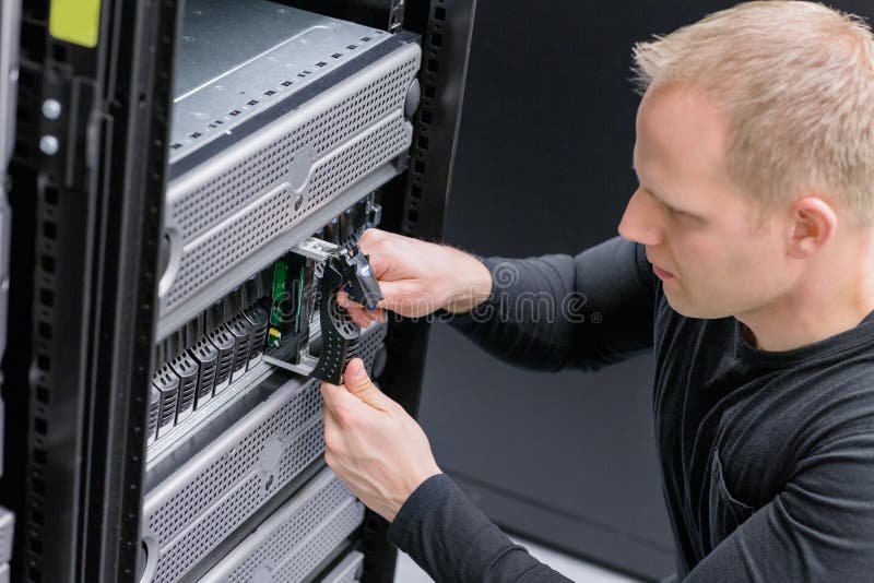 It Consultant Insert SAN Hard Drive Stock Photo - Image of holding ...