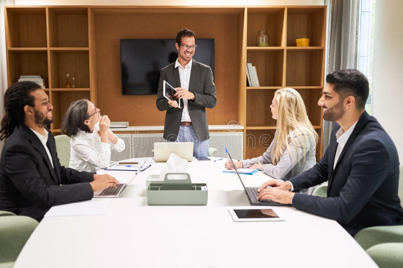 Consultant or Manager Giving a Presentation in the Consulting Workshop ...