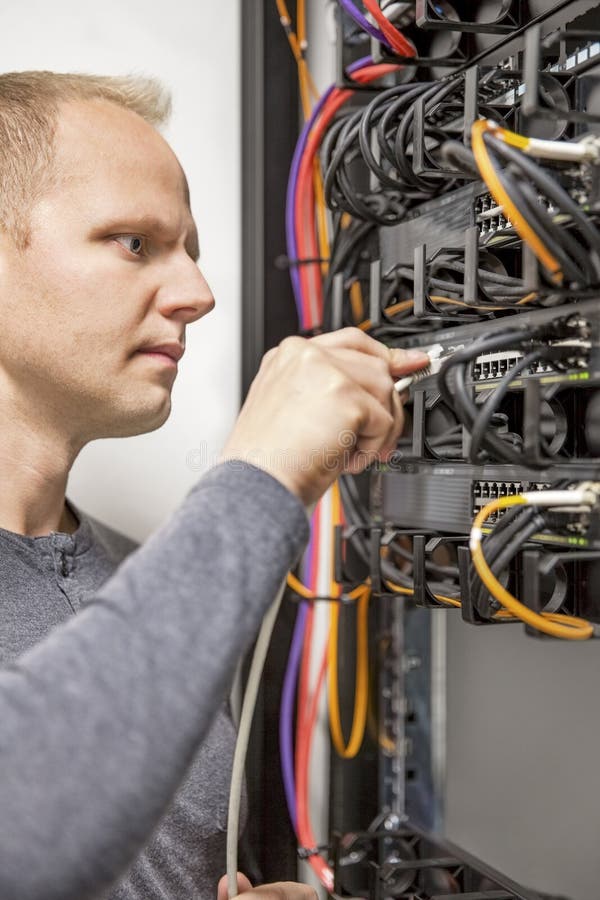 It Engineer Builds Network Rack in Datacenter Stock Photo - Image of ...
