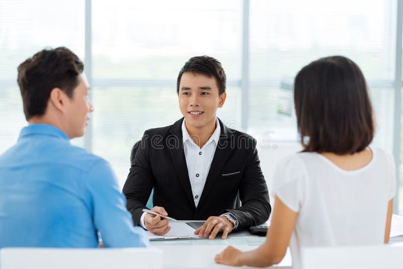 Consultation with Real Estate Broker Stock Photo - Image of vietnamese ...