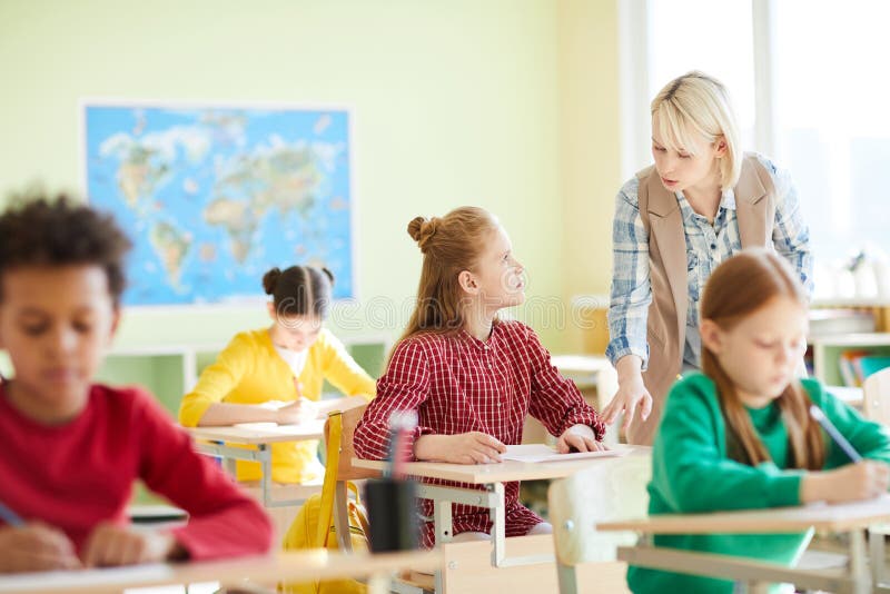 Consulting about task stock image. Image of schoolkid - 117559387