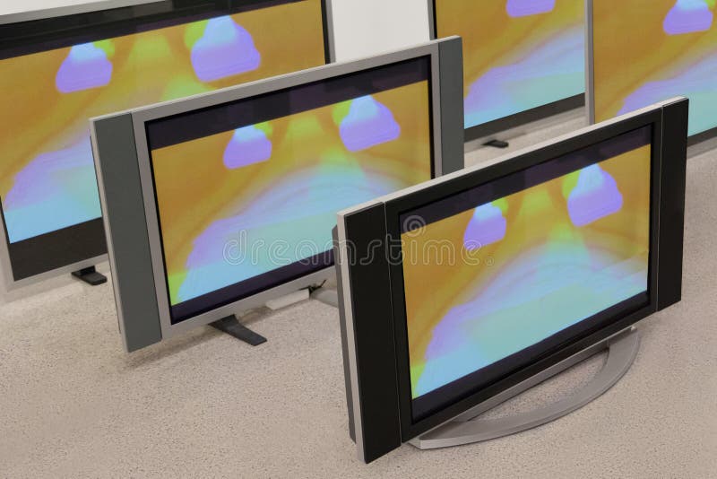 Consumerism, Electronics Shopping TV Sets in Technology Store Stock ...