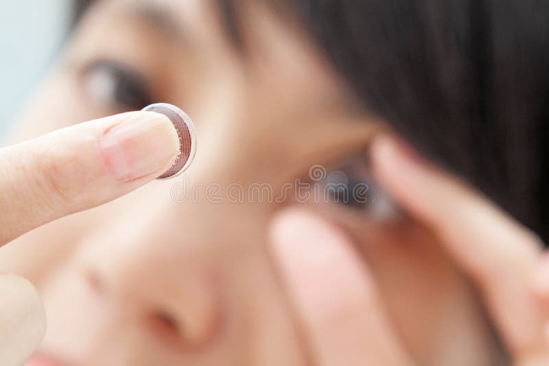 Young Woman with Contact Lens Stock Image - Image of finger, eyewear ...