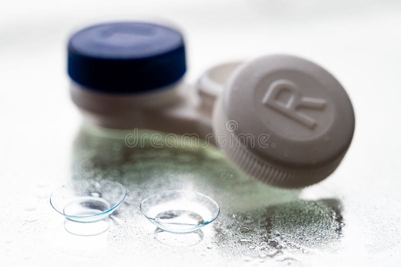Contact Lenses on Reflective Surface. Stock Photo - Image of ...